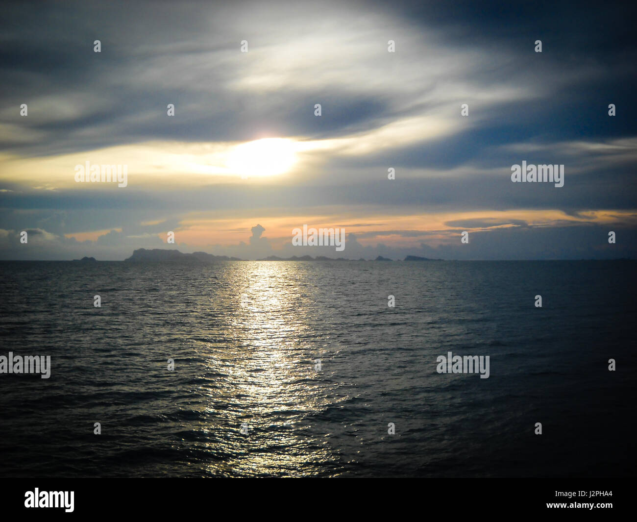 Sunset close to Island. During a boat trip in the evening. Great view ...