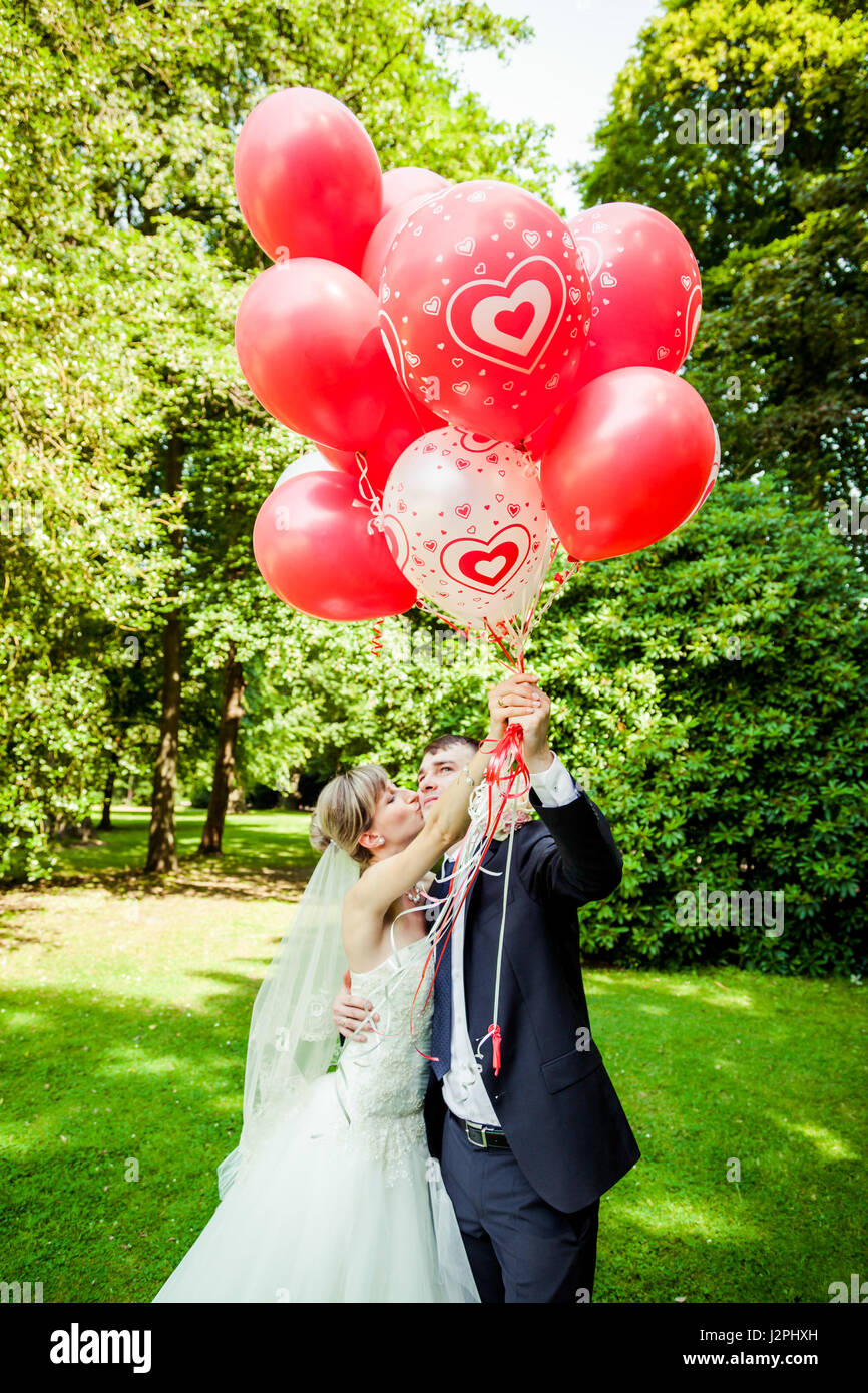 beautiful couple with balloons Stock Photo - Alamy