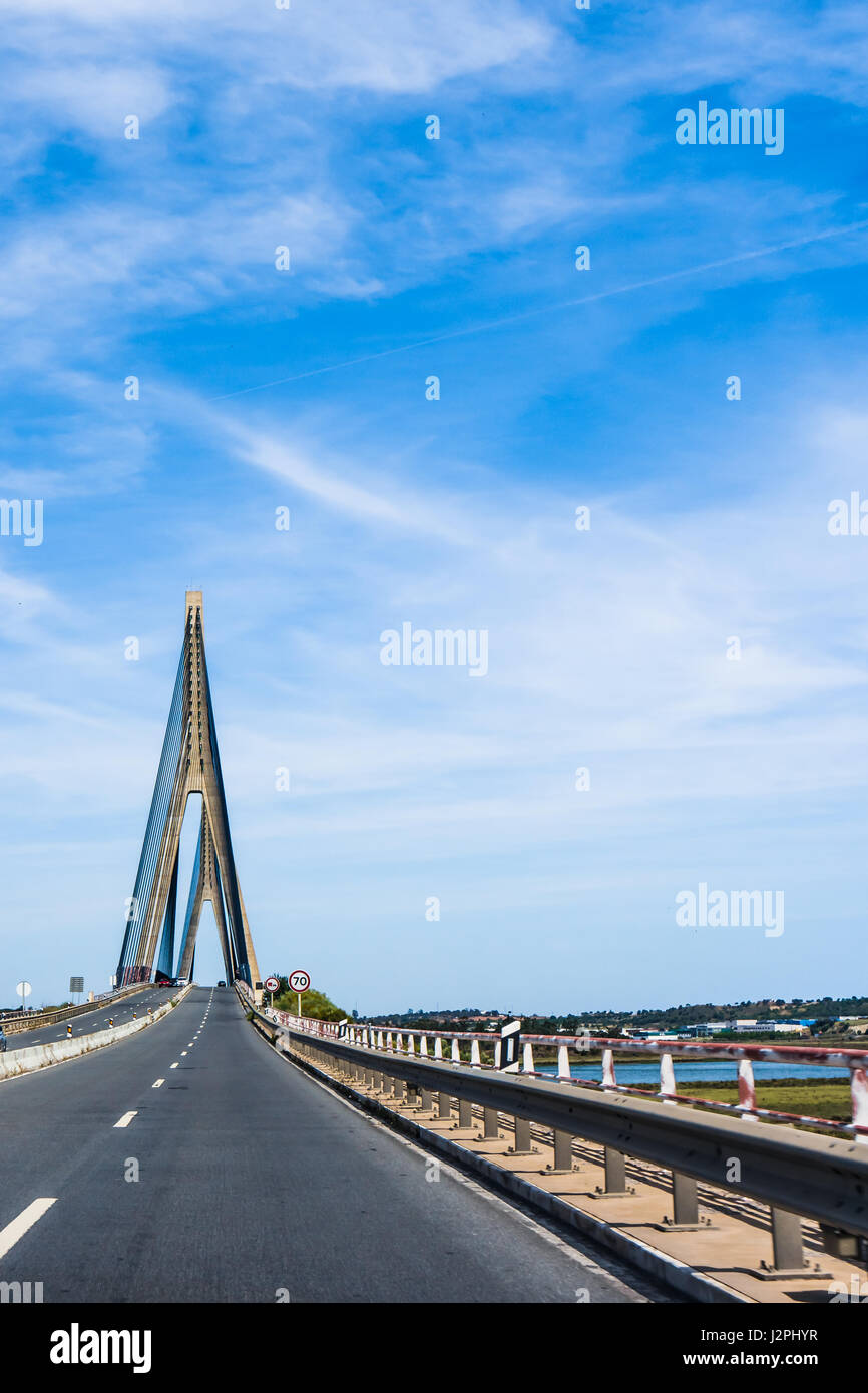 Suspension bridge over the river between Spain and Portugal. Bridge ...