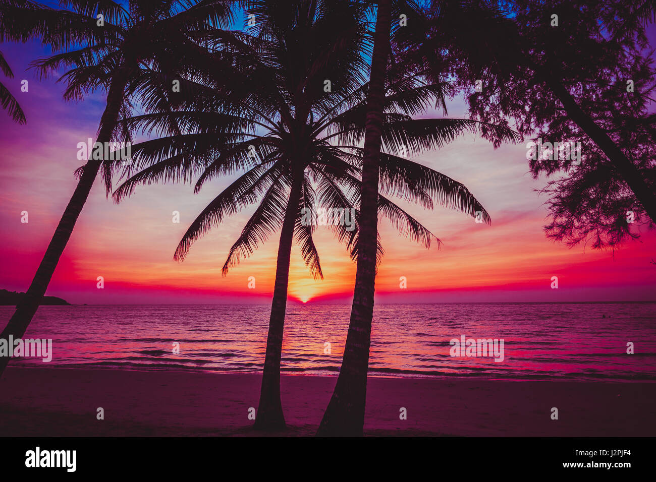 sunset tropical beach. Beautiful sunset Stock Photo - Alamy