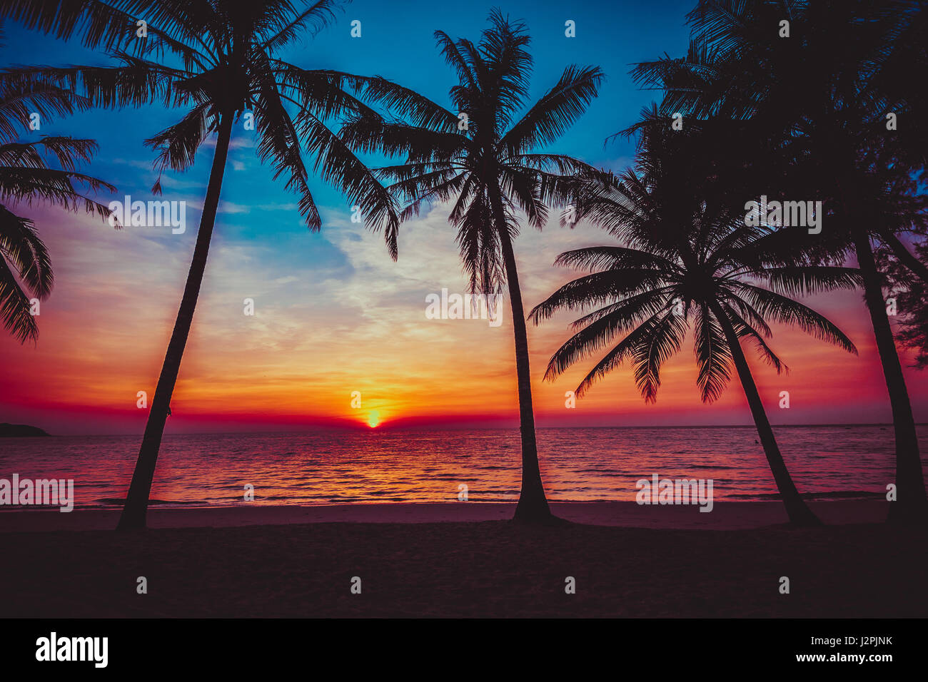 sunset tropical beach. Beautiful sunset Stock Photo - Alamy