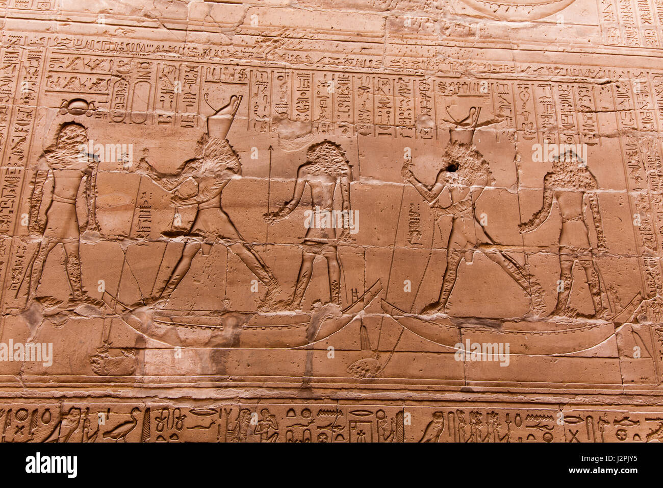 Egyptian hieroglyphics on the stone wall. Ancient stone carved Egyptian ...