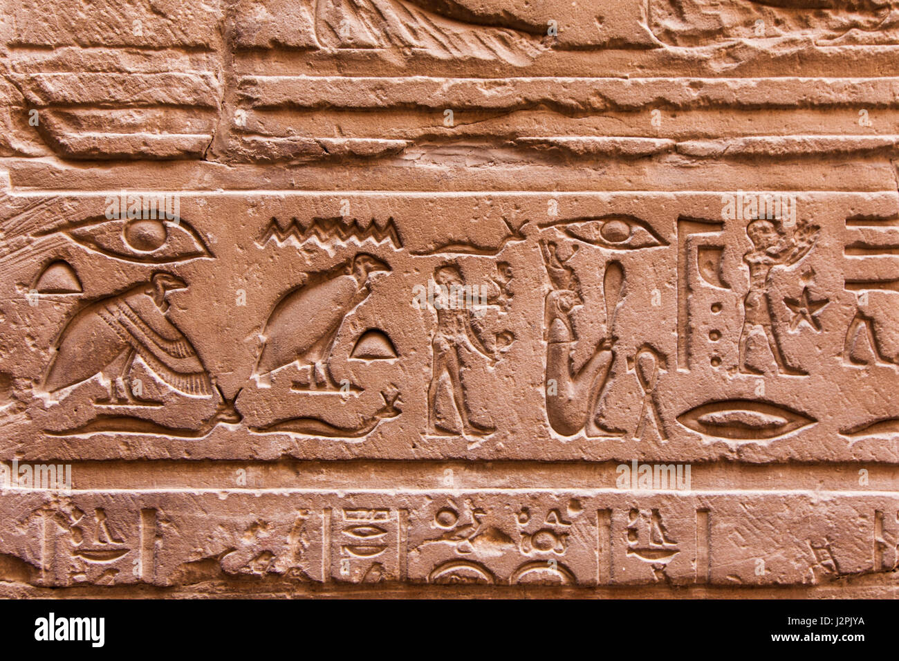 Egyptian hieroglyphics on the stone wall. Ancient stone carved Egyptian ...