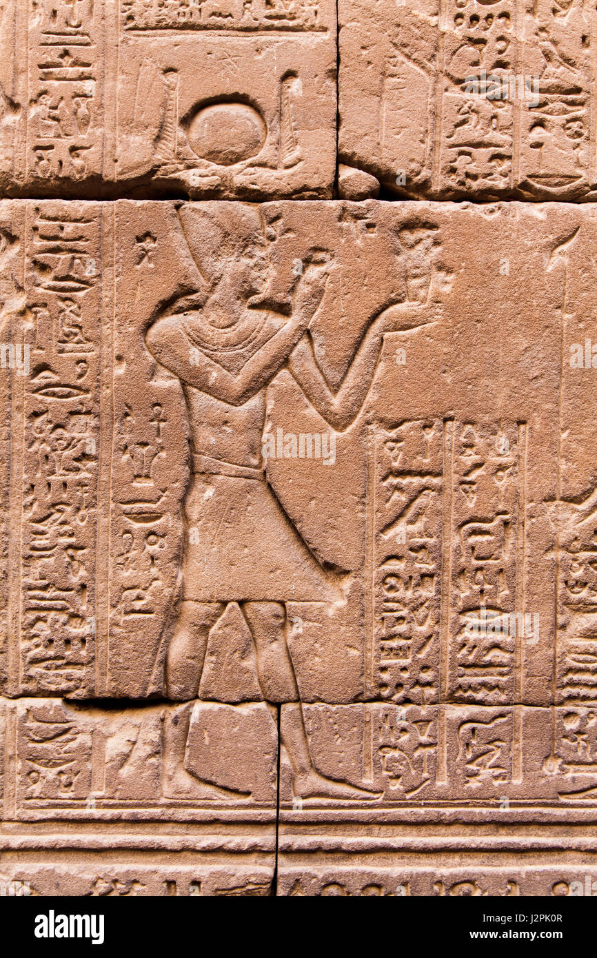 Egyptian hieroglyphics on the stone wall. Ancient stone carved Egyptian ...