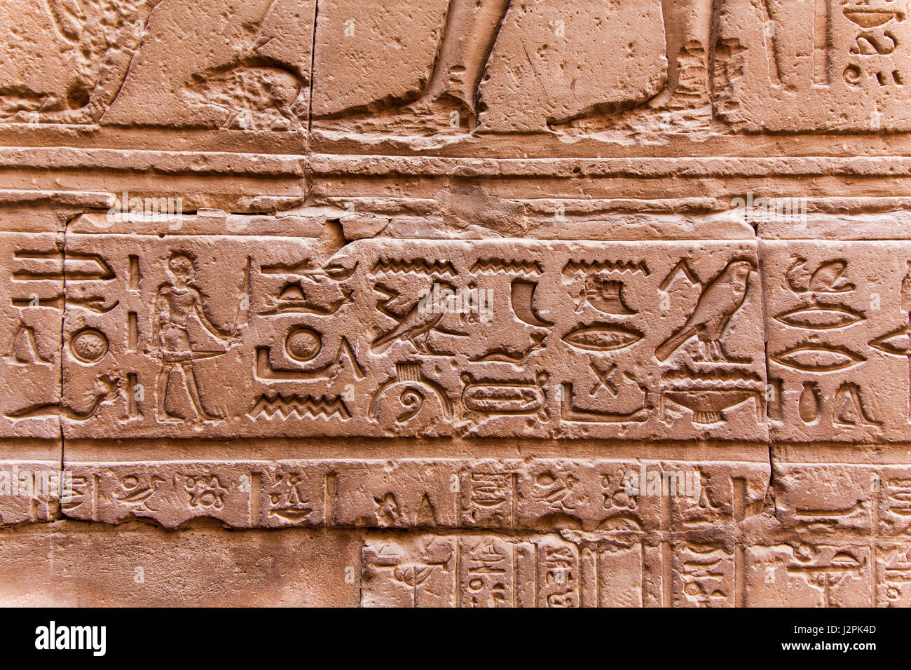 Egyptian hieroglyphics on the stone wall. Ancient stone carved Egyptian ...