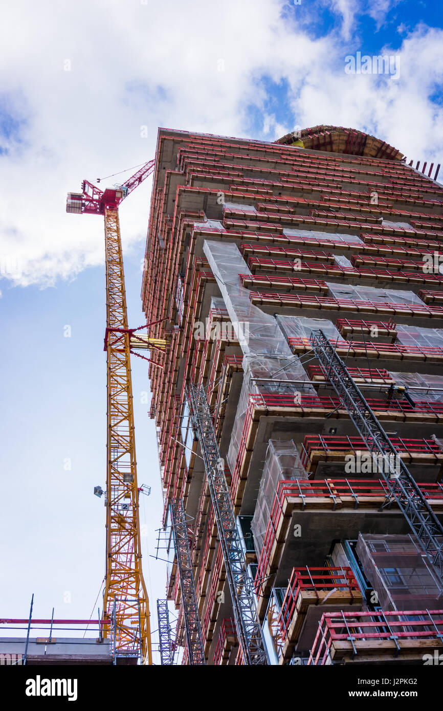 Crane and building construction. big building construction Stock Photo ...