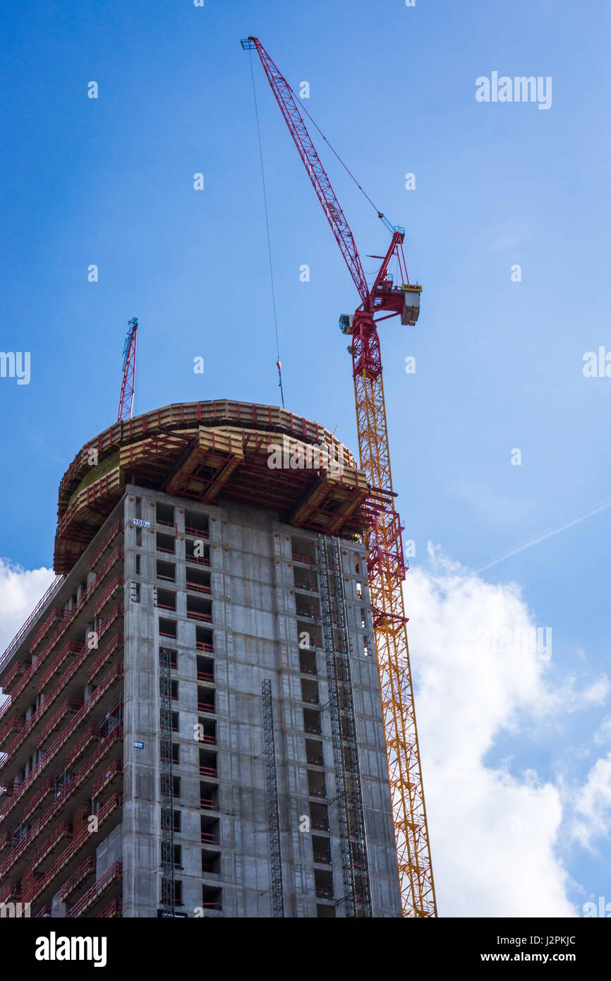 Crane and building construction. big building construction Stock Photo ...