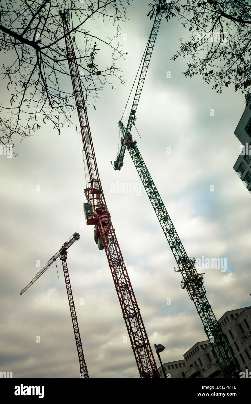 Crane and building construction. big building construction Stock Photo ...