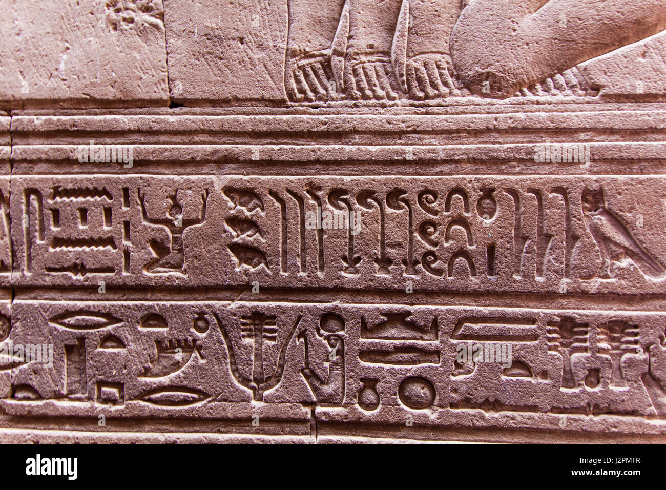 Egyptian hieroglyphics on the stone wall. Ancient stone carved Egyptian ...