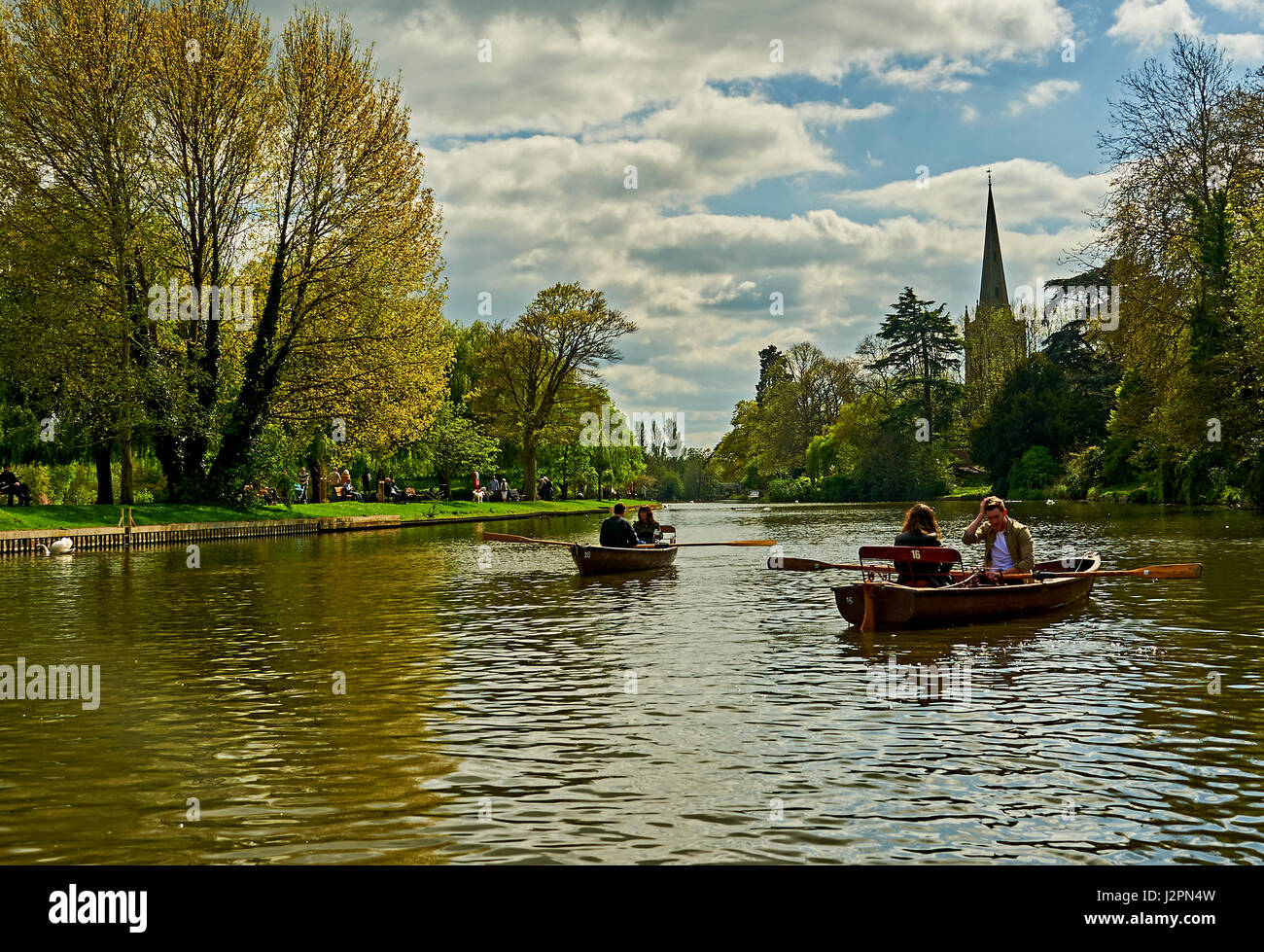 Two couples in rowing boats on the River Avon in Stratford upon Avon ...