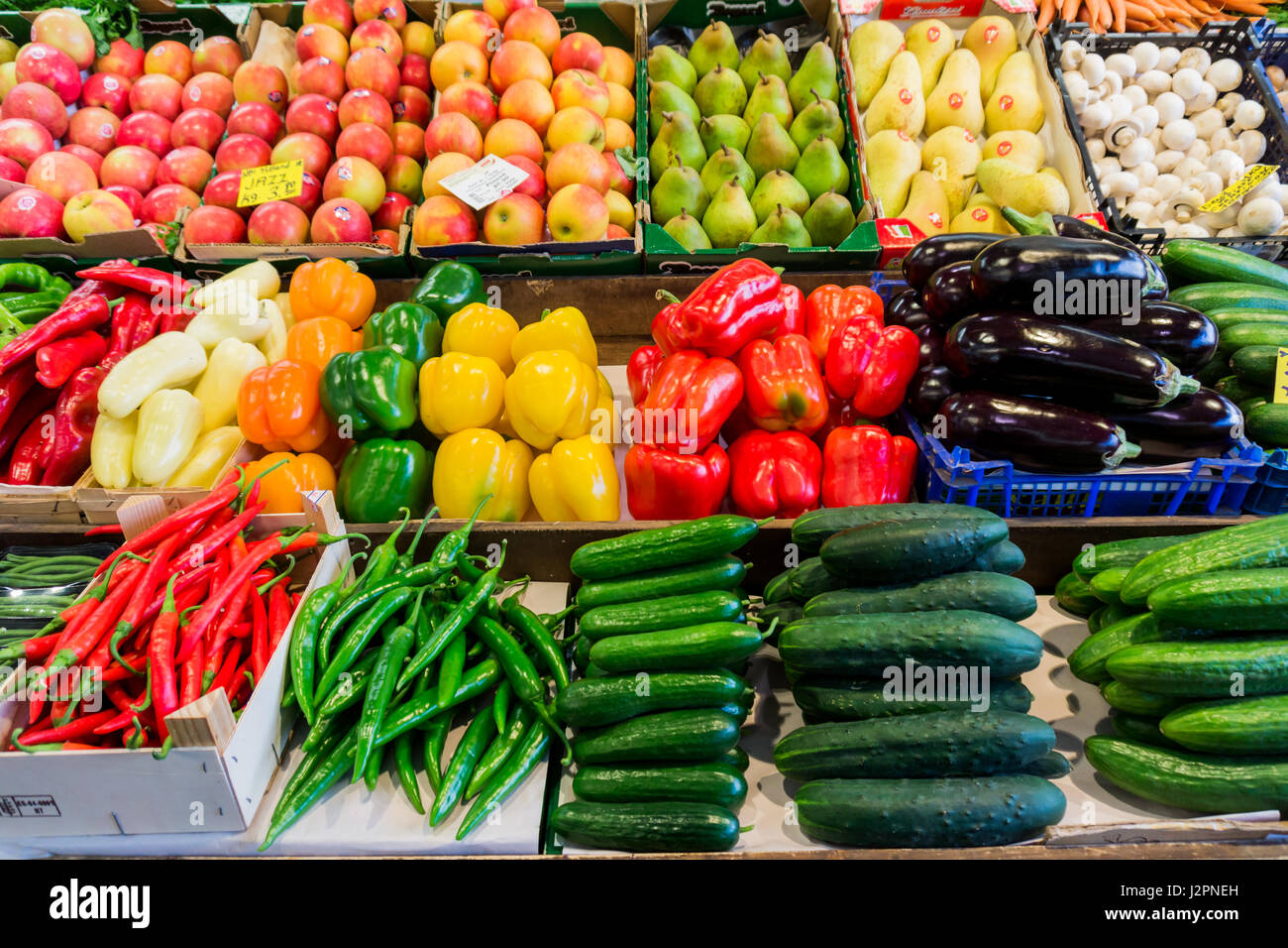 market with various colorful fresh fruits and vegetables. Farmers ...