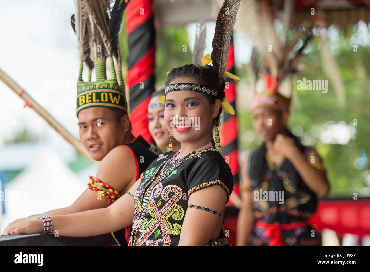 :Murut lady in traditional costume decorated with colorful beads during ...