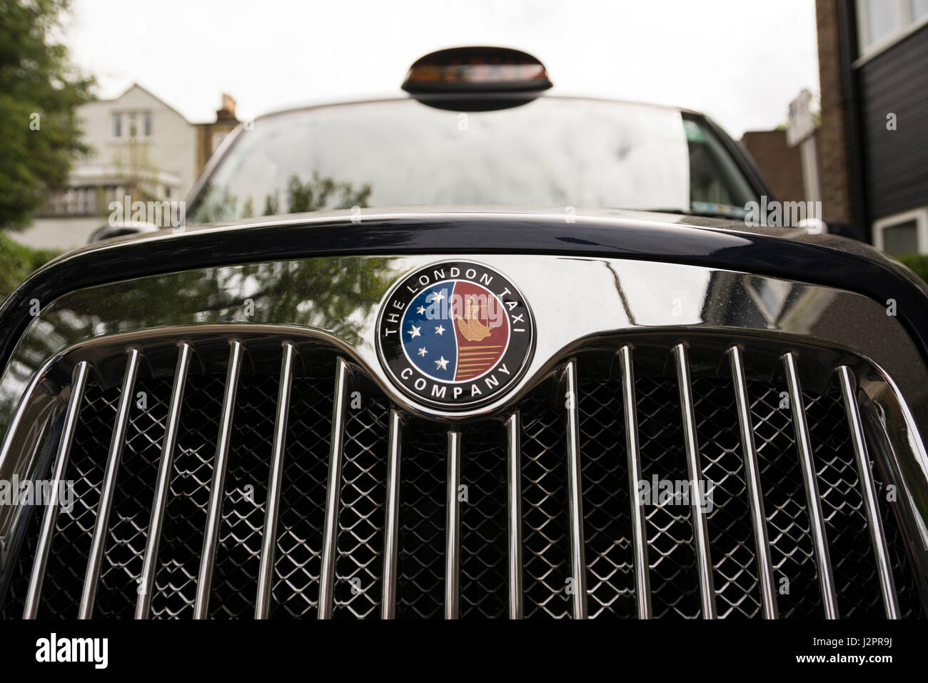 The front grill and logo of the London Taxi Company Stock Photo - Alamy