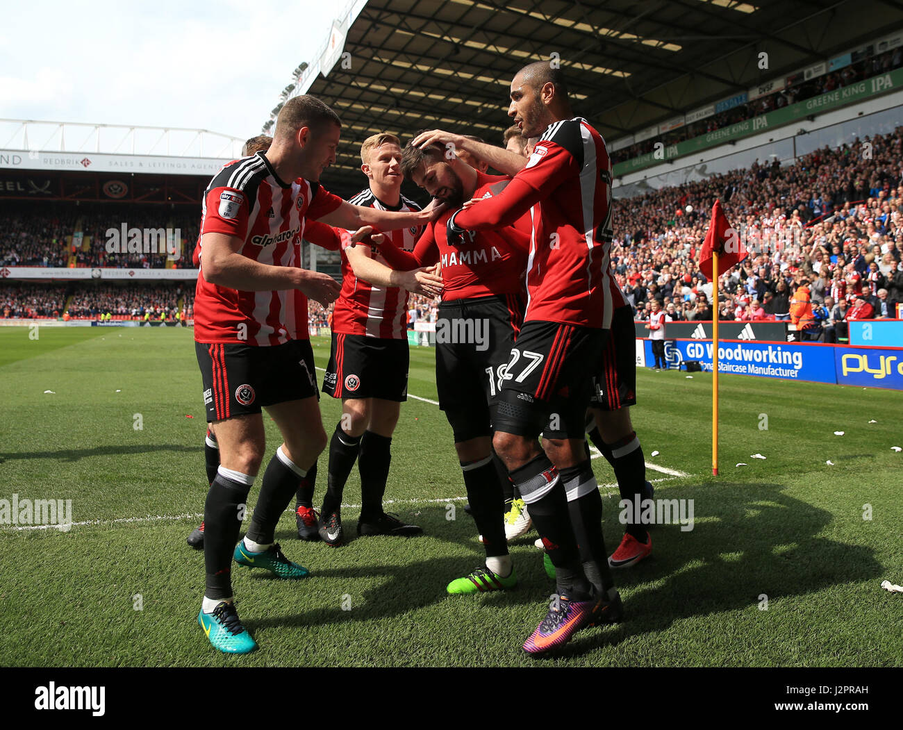 Sheffield United's Kieron Freeman (centre) celebrates scoring his side ...