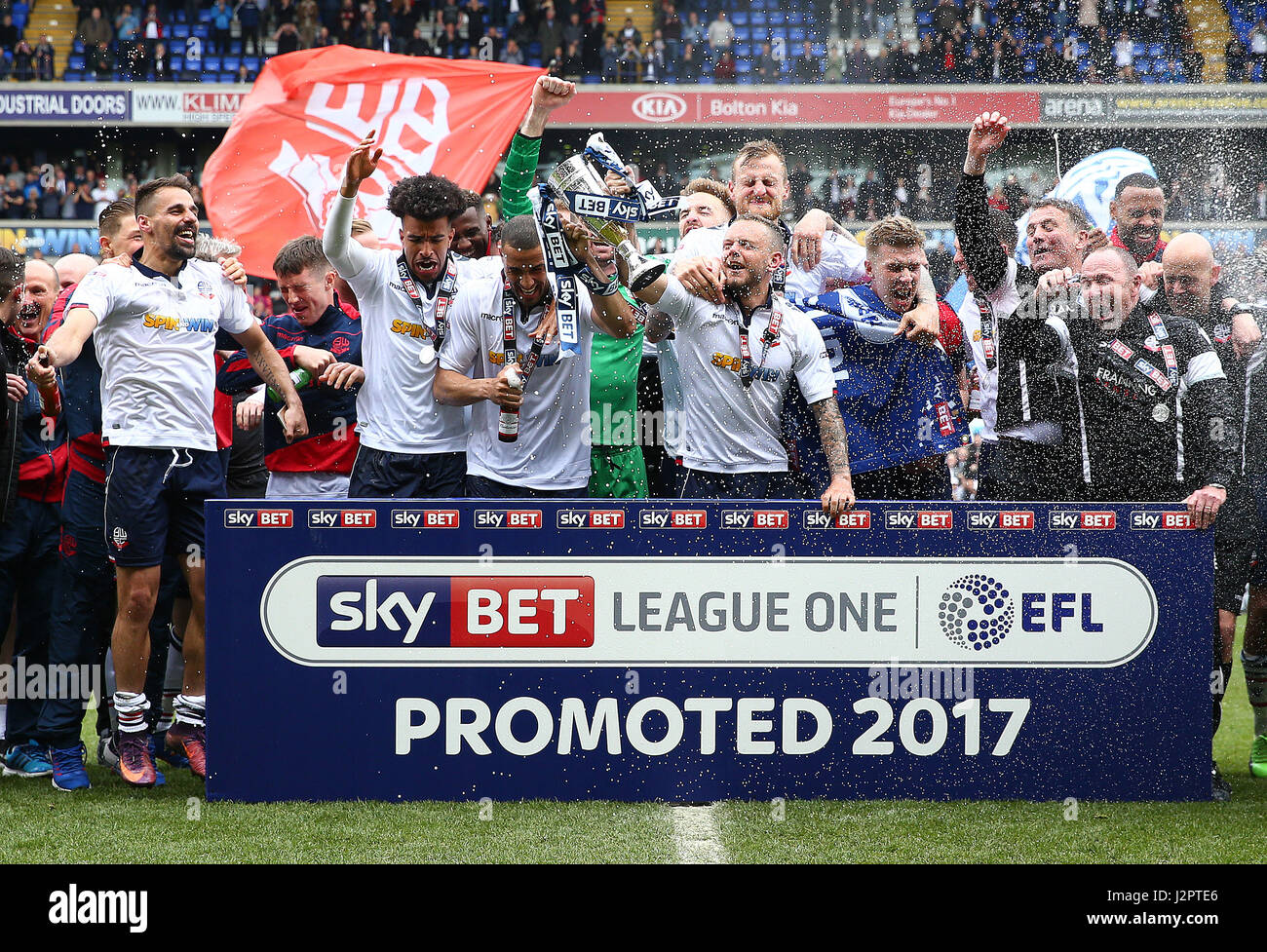 Bolton's players and coaching staff celebrate promotion to the ...