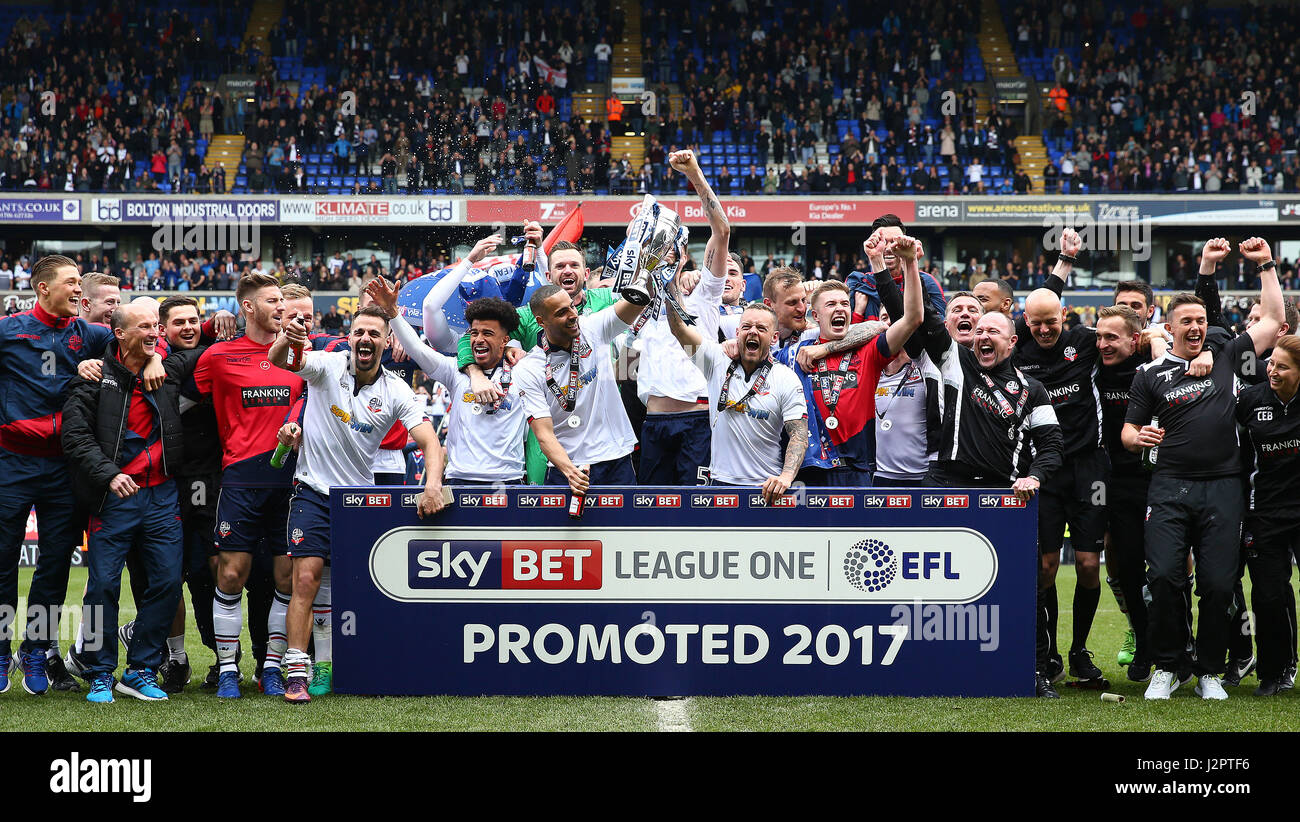 Bolton's players and coaching staff celebrate promotion to the ...