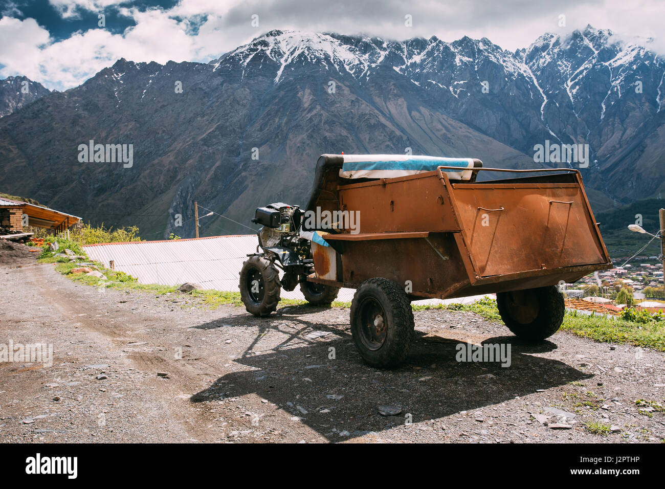 Stepantsminda Gergeti, Georgia. Small Old Two-wheel Tractor Or Walking ...