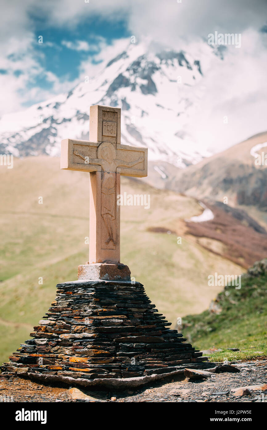 Cross On A Pyramid Of Stones On Kazbek Mount Background. Gergeti ...
