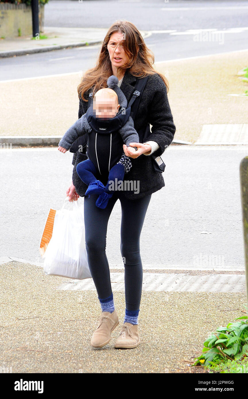 Jools Oliver out with her baby son River Rocket in North London ...