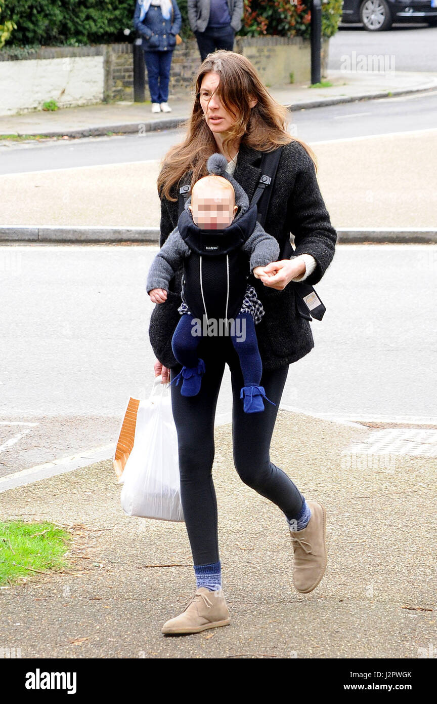 Jools Oliver out with her baby son River Rocket in North London ...