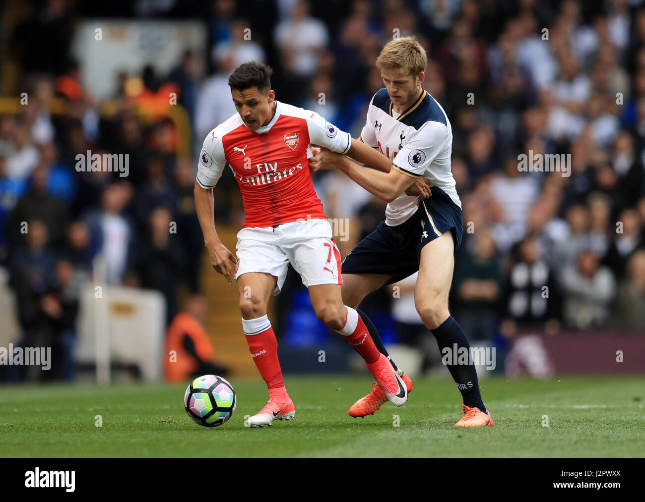 Arsenal's Alexis Sanchez and Tottenham Hotspur's Eric Dier (right ...