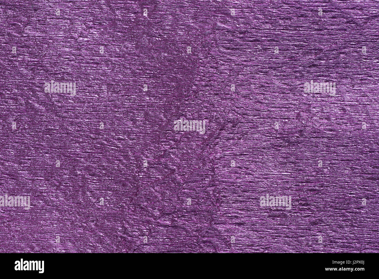 violet color creased metallic foil background texture Stock Photo - Alamy