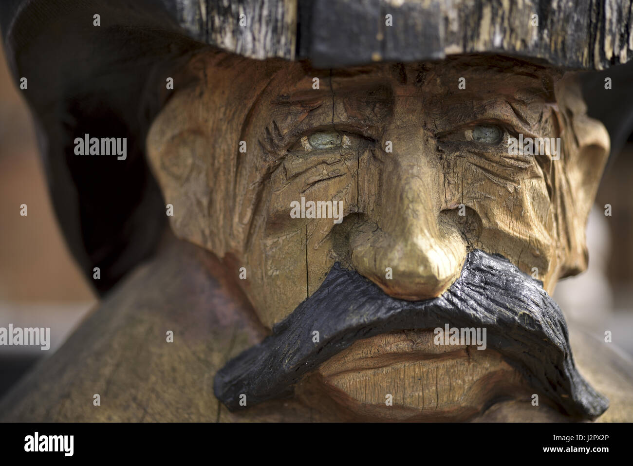 A wooden carving of a cowboy Stock Photo - Alamy