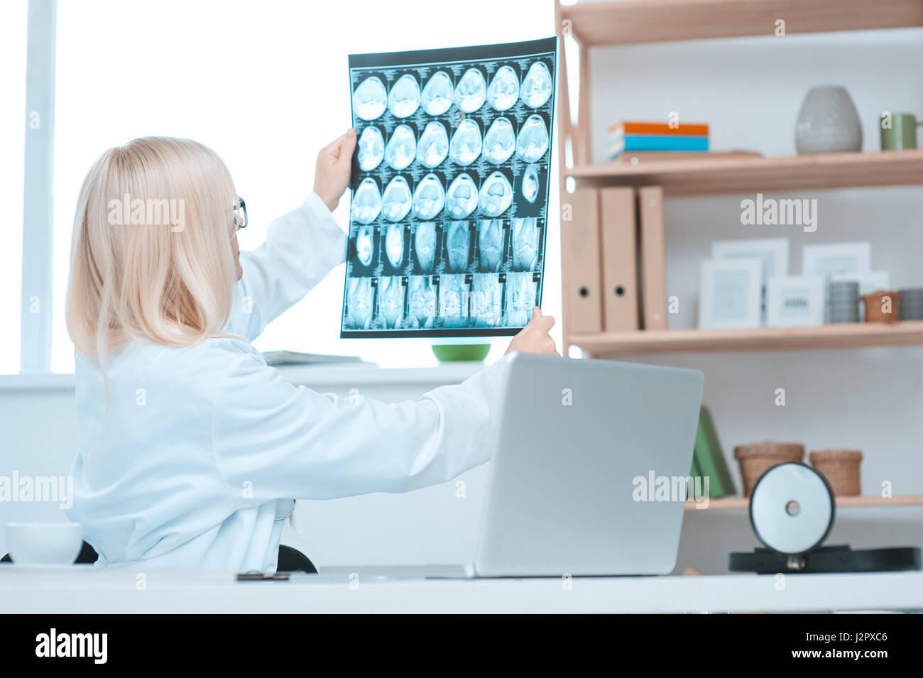 Young woman doctor occupation in the hospital office Stock Photo - Alamy