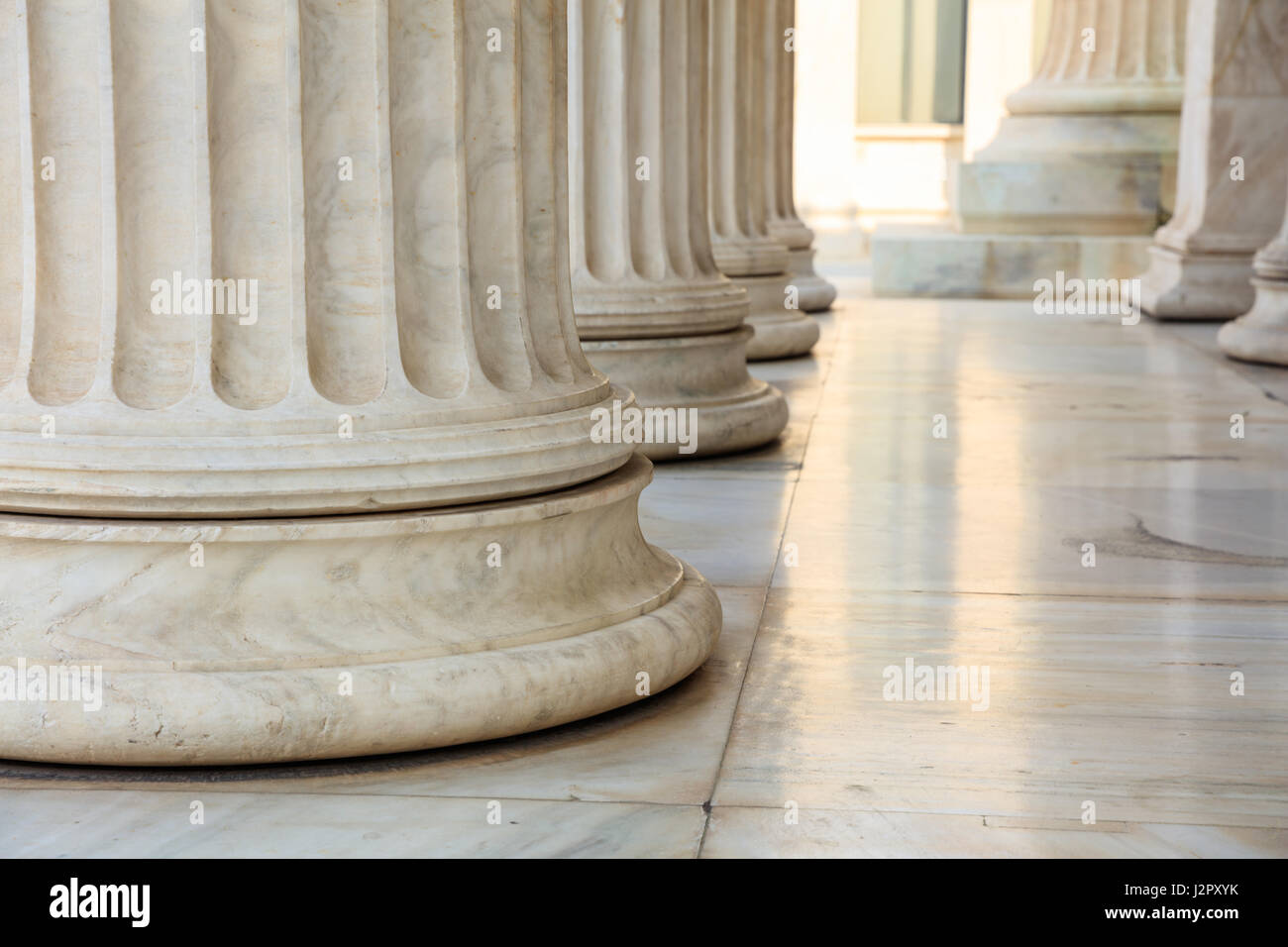Classical marble pillars detail on the facade of a building Stock Photo ...