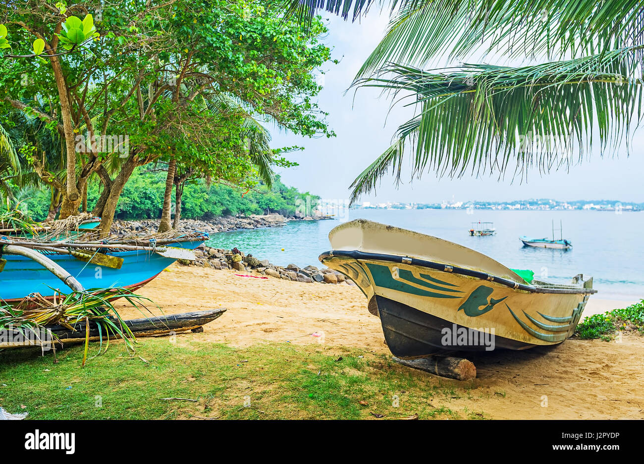 The secret Jungle Beach, located at the foot of Rumassala Mount between ...