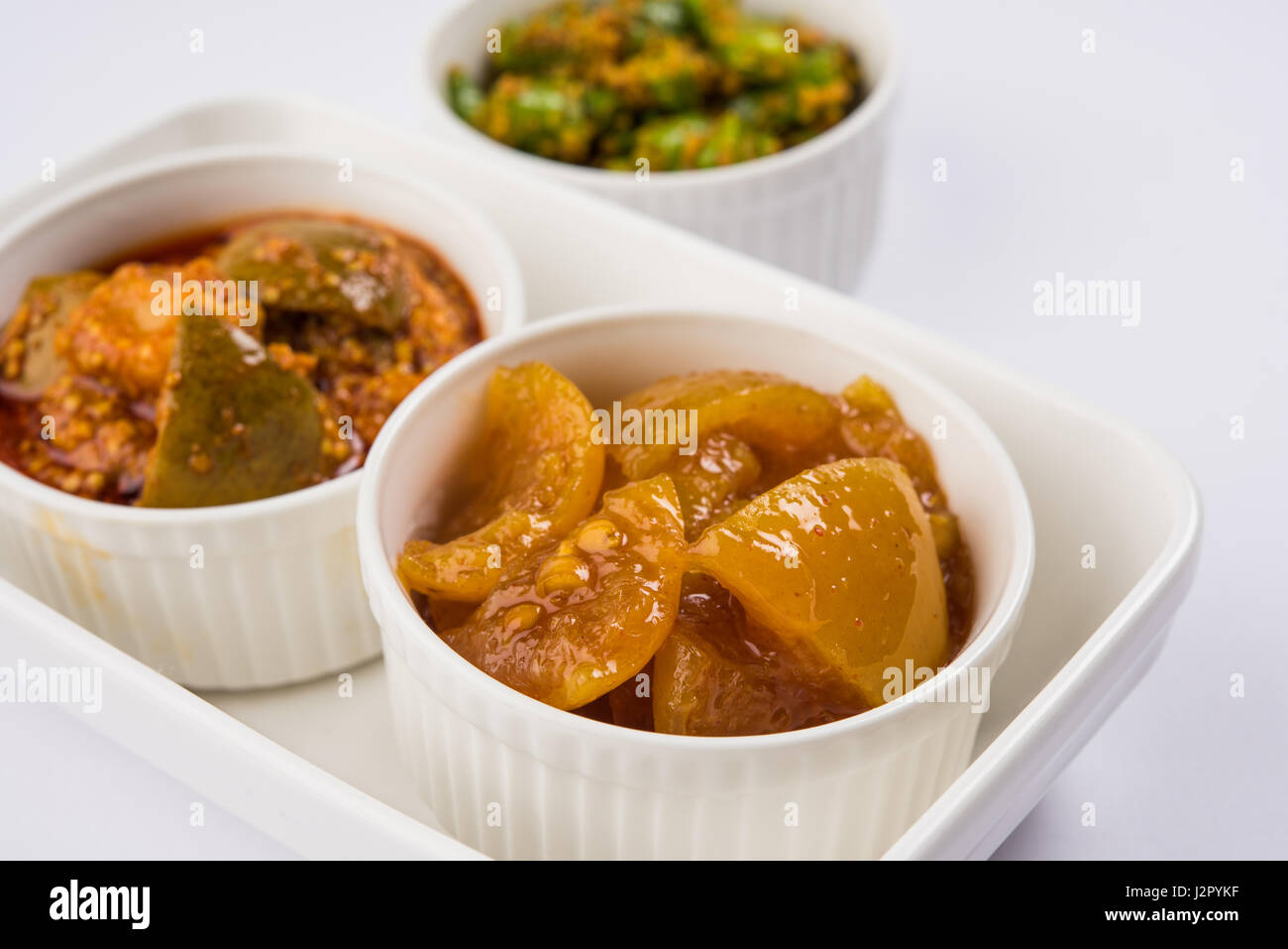Group photograph of indian pickles like mango pickle , lemon pickle and ...