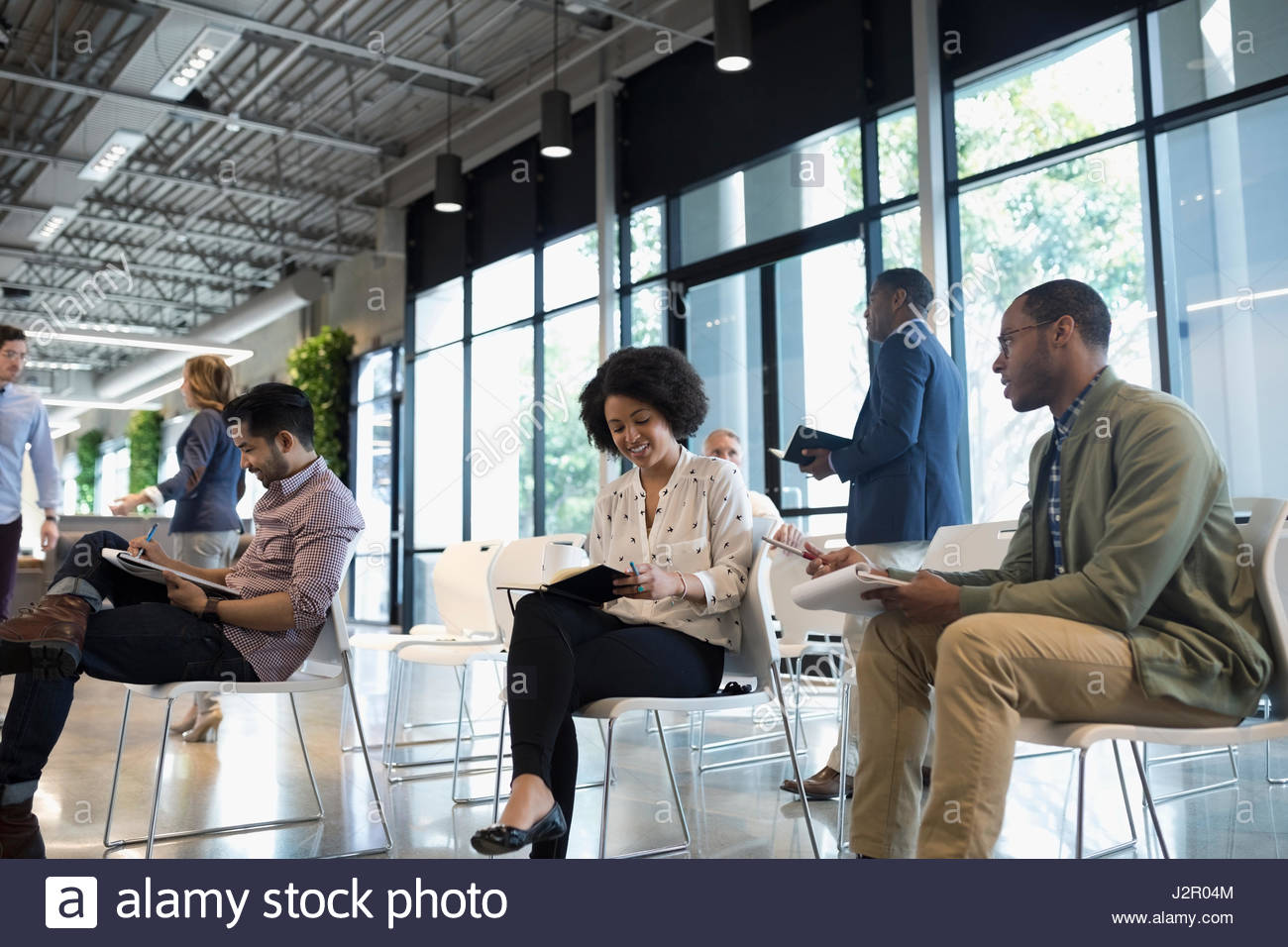 Woman seating in a chair hi-res stock photography and images - Alamy