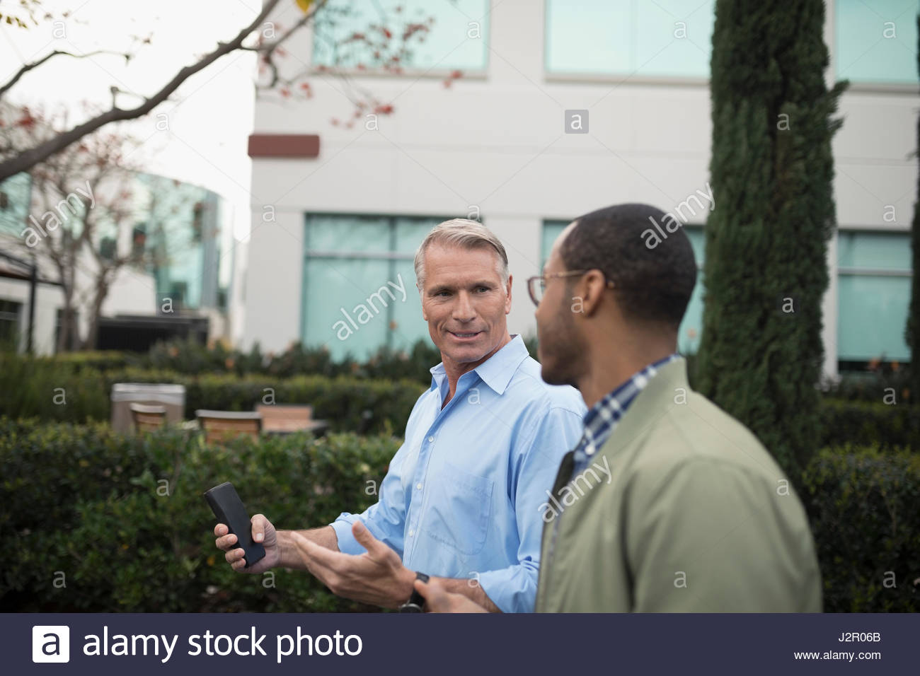 Walking into office building hi-res stock photography and images - Alamy