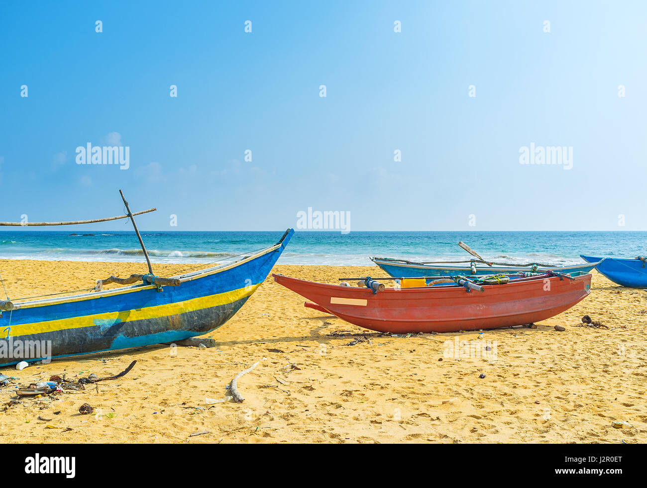 The fishermen of Hikkaduwa use the large oruwa boats and small canoes ...