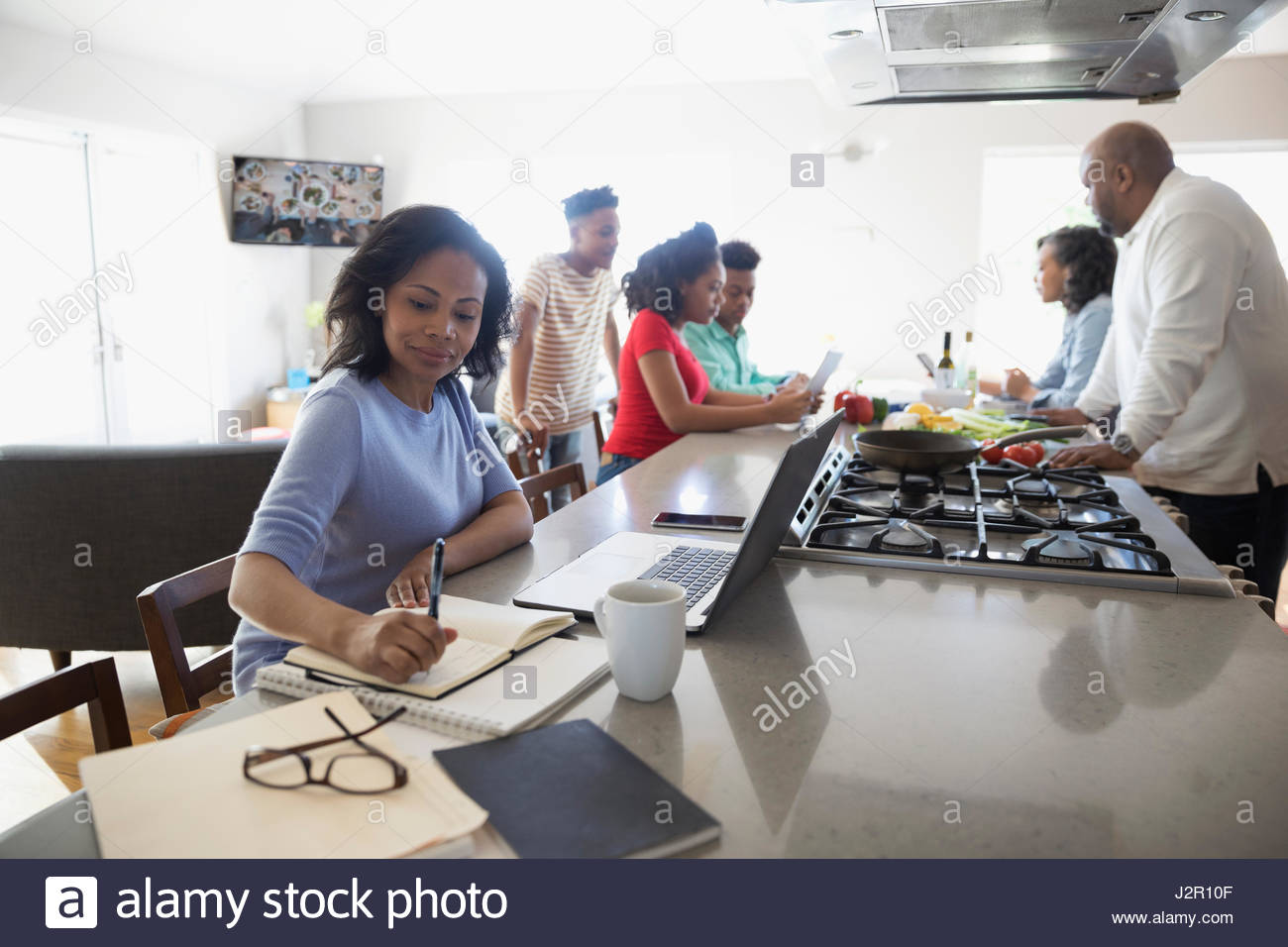 African woman cooking dinner hi-res stock photography and images - Alamy