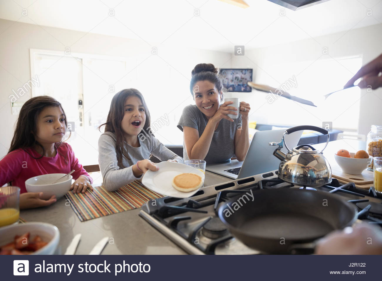 Real latino family kitchen cooking hi-res stock photography and images ...