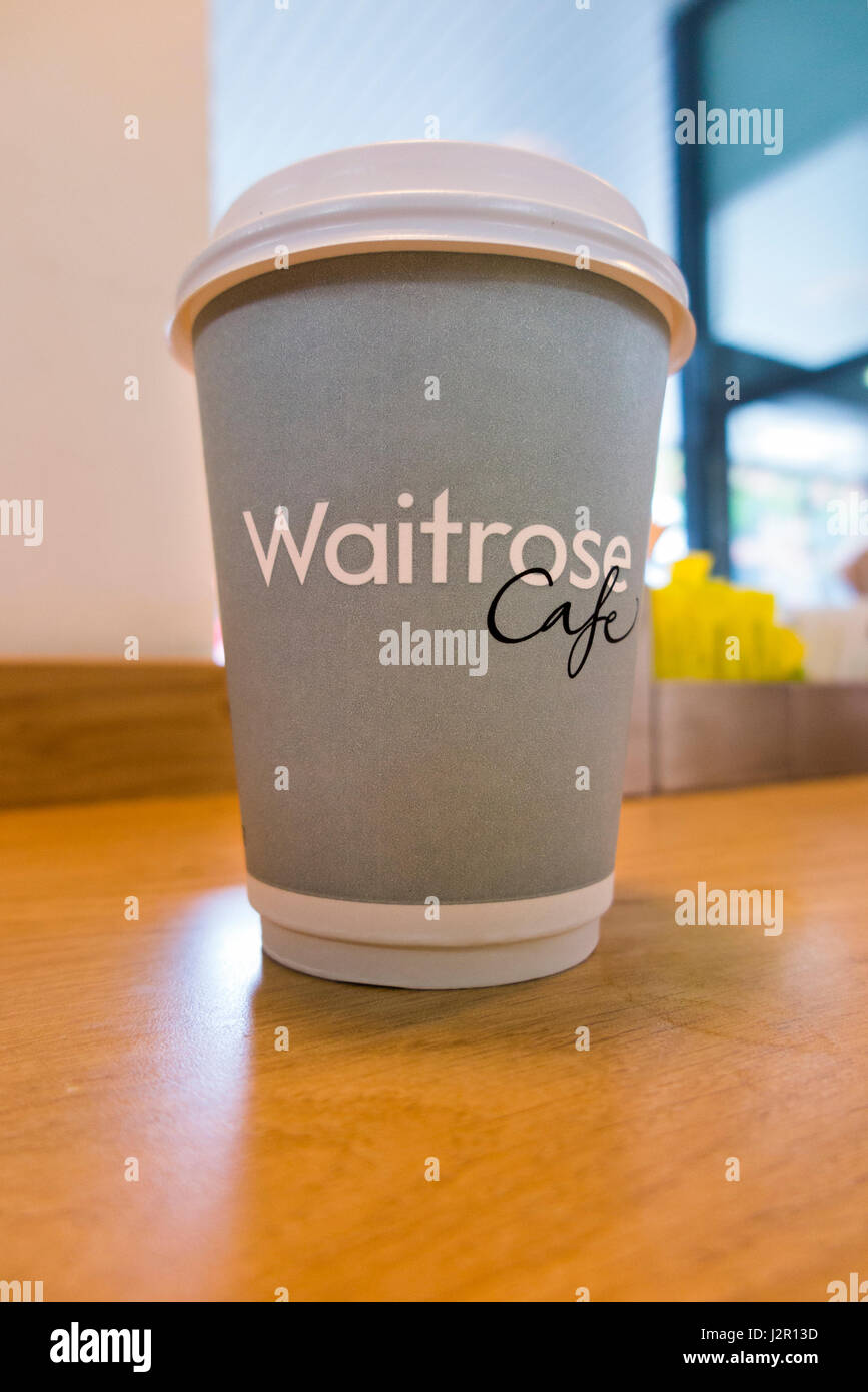 A cup of free coffee at a Waitrose supermarket. UK. This cup is a ...