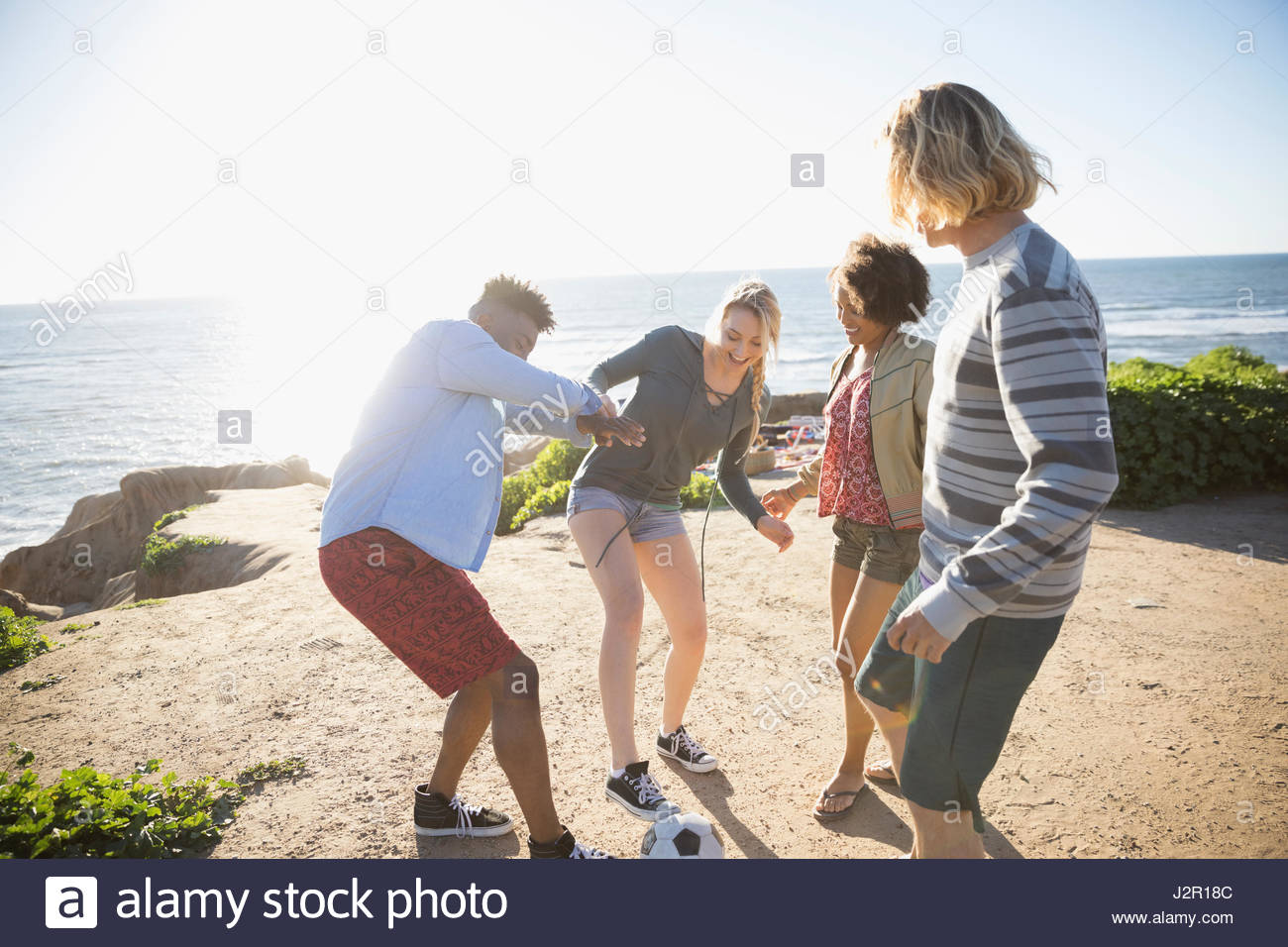 Friends playing soccer hi-res stock photography and images - Alamy