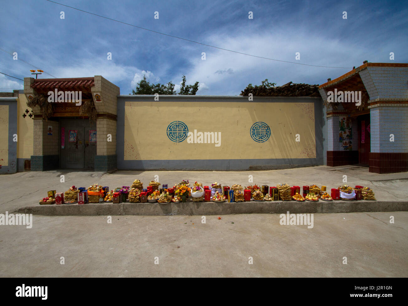 An offering of food at a Buddhist Ceremony in a Tibetan region of ...