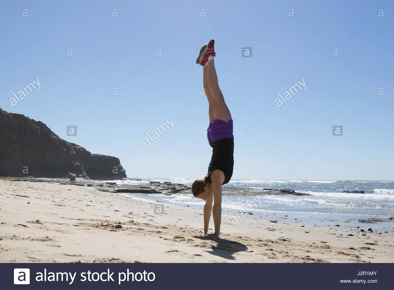 Handstand woman hi-res stock photography and images - Alamy