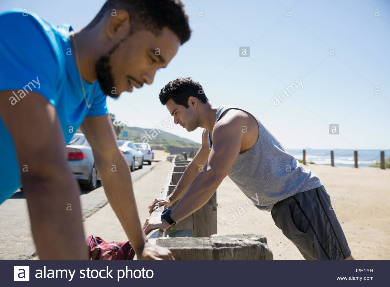 Man leaning on guardrail High Resolution Stock Photography and Images ...