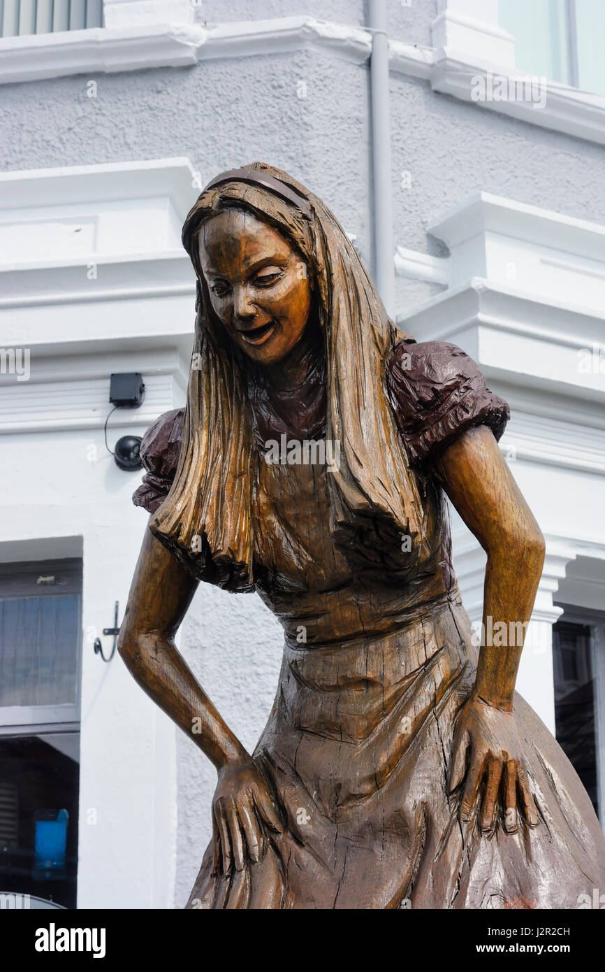 Alice in wonderland wooden statue hi-res stock photography and images ...