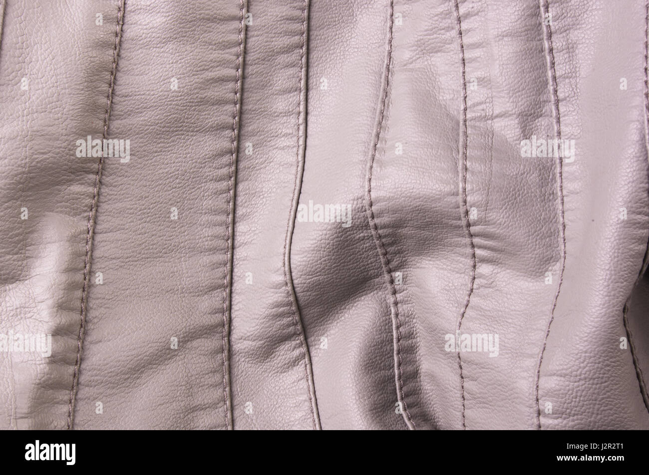 texture beige leather jacket with seams, close-up Stock Photo - Alamy
