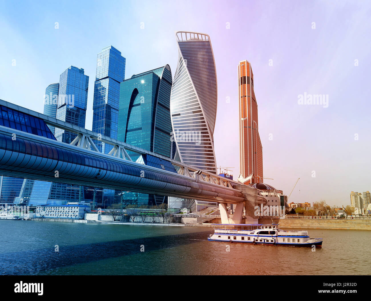 Photo of modern towers of skyscrapers illuminated by the sun Stock ...