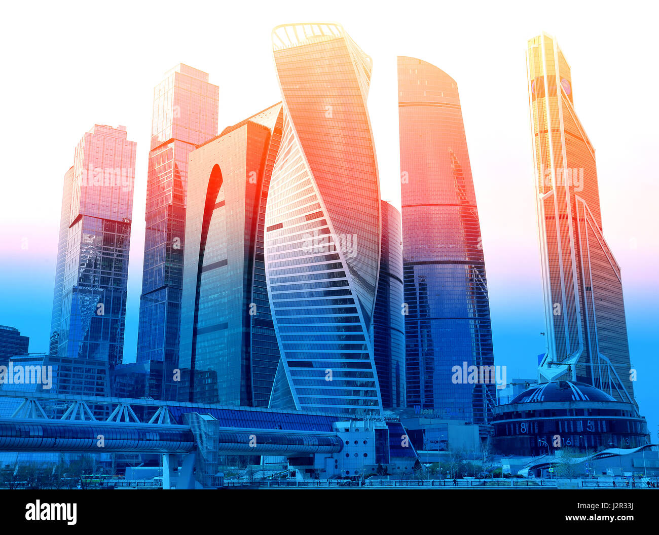Photo of modern towers of skyscrapers illuminated by the sun Stock ...