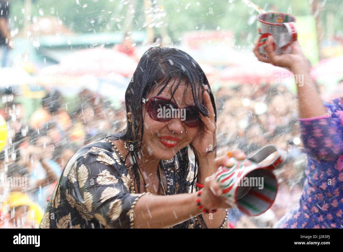 Ethnic Marma girls participate on water festival on occasion of Baisabi ...