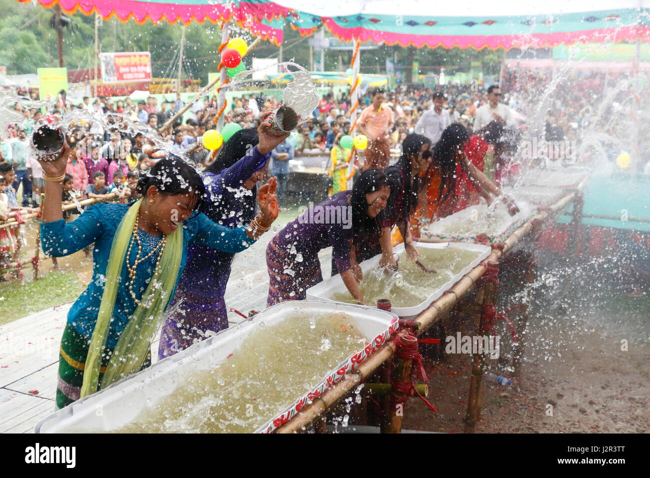 Ethnic Marma girls participate on water festival on occasion of Baisabi ...