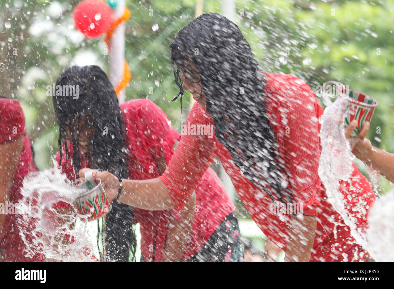 Ethnic Marma girls participate on water festival on occasion of Baisabi ...