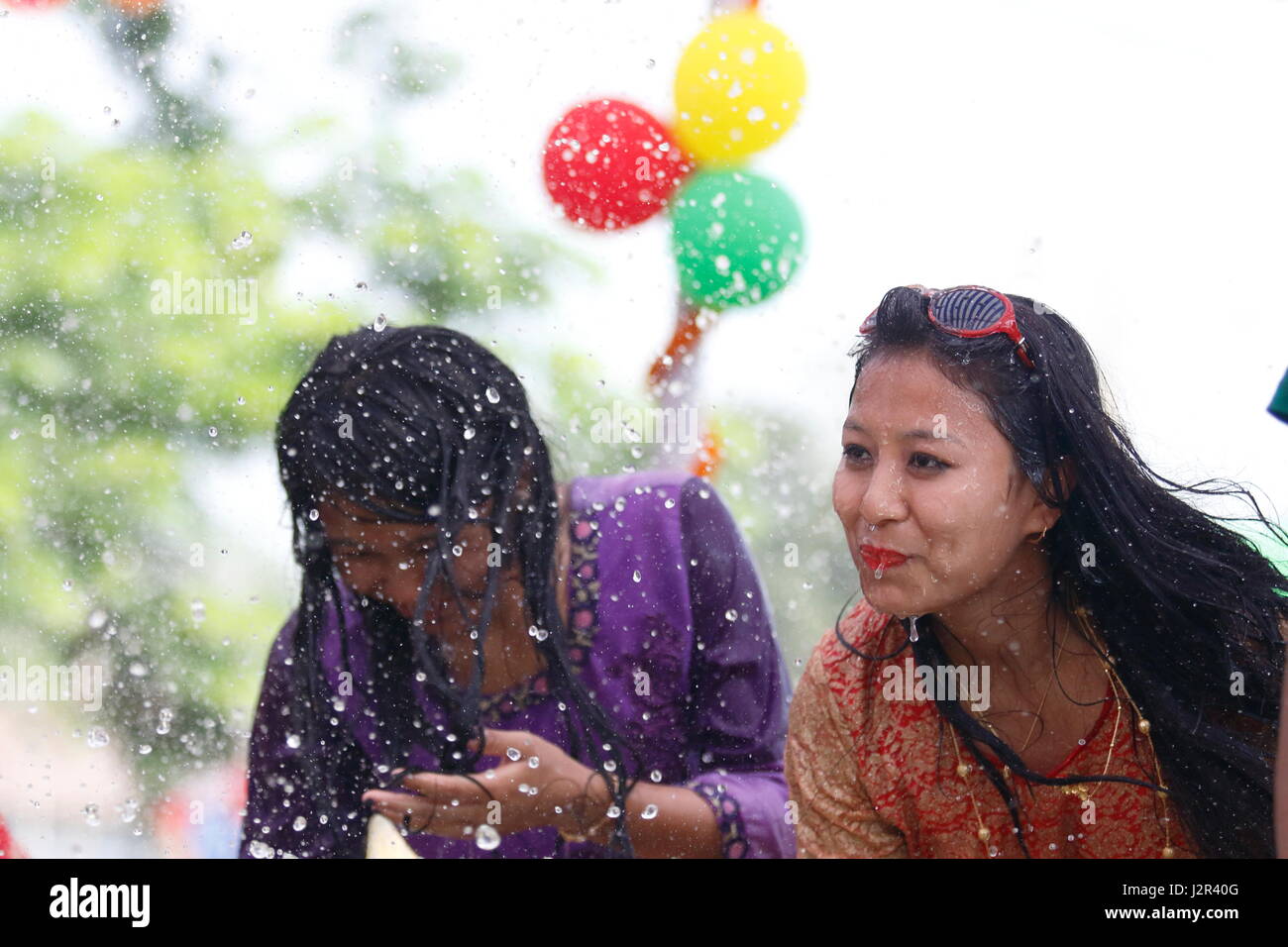 Ethnic Marma girls participate on water festival on occasion of Baisabi ...