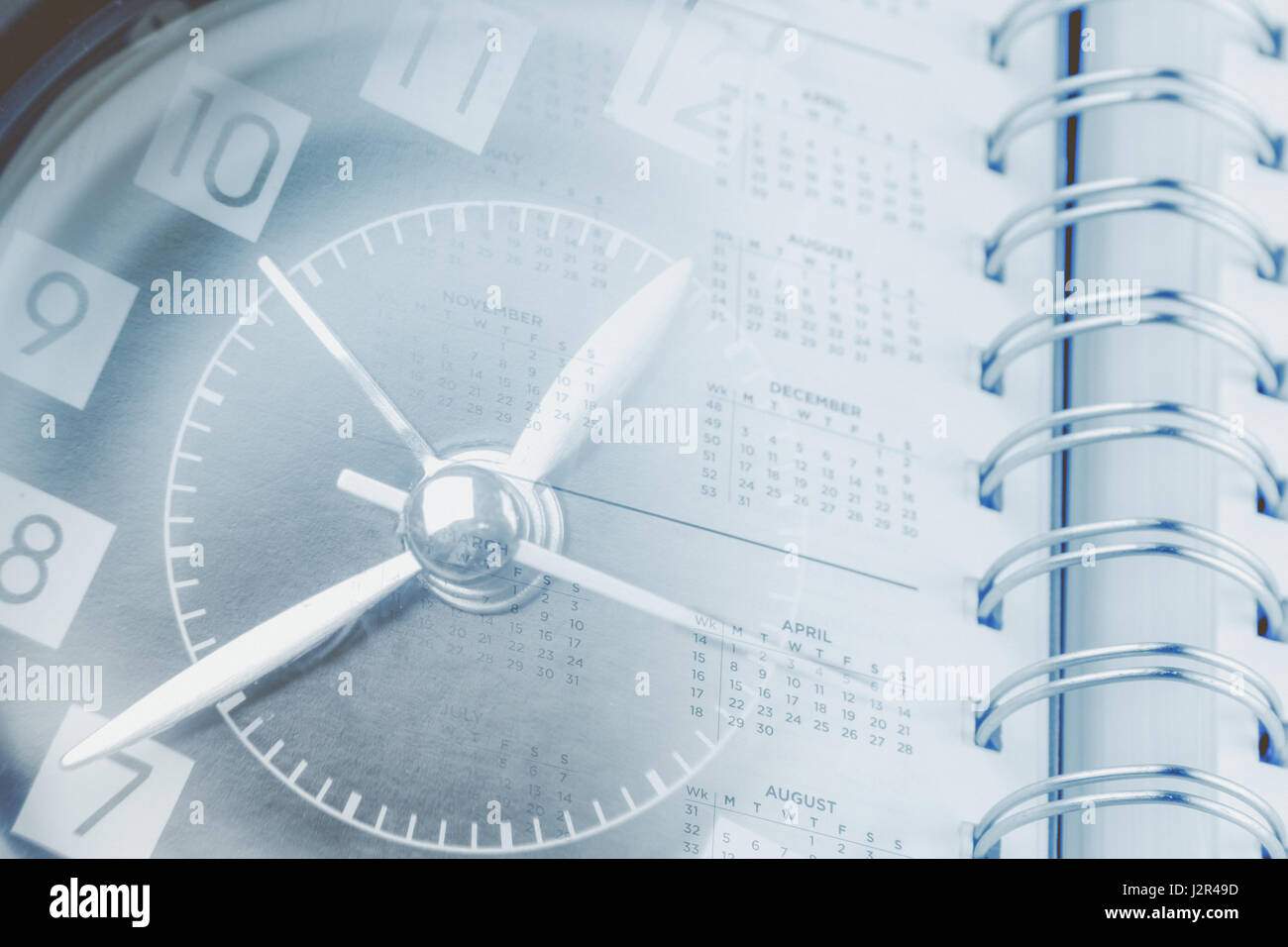 Clock face and diary calendar Stock Photo - Alamy